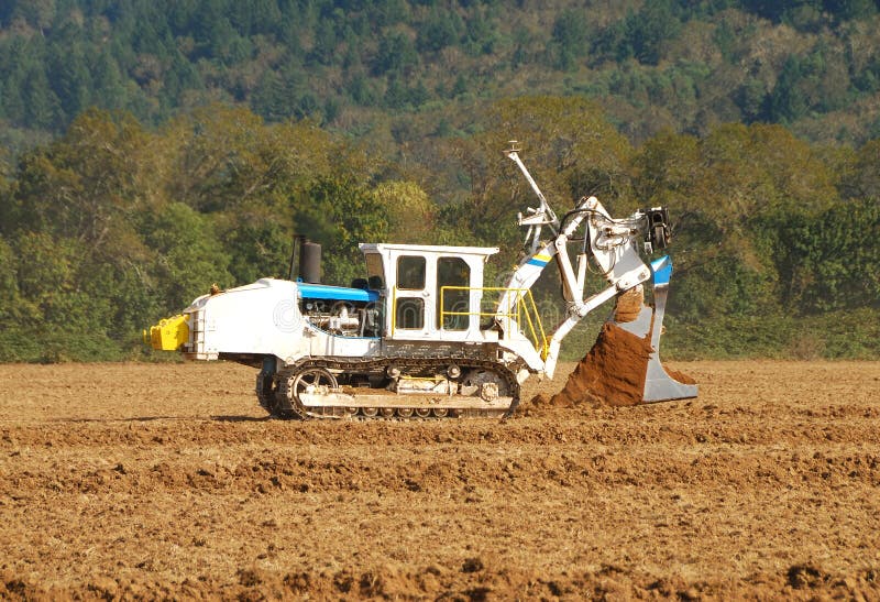 Drain Pipe Layer stock photo. Image of machine, soil - 32393334