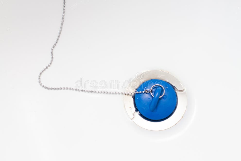 Drain plug on white bathe stock image. Image of bathroom - 137272861