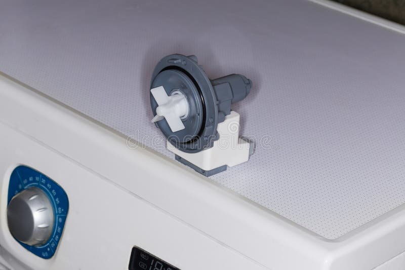 Drain Pump Assembly of Modern Washing Machine on a Washer Stock Image ...