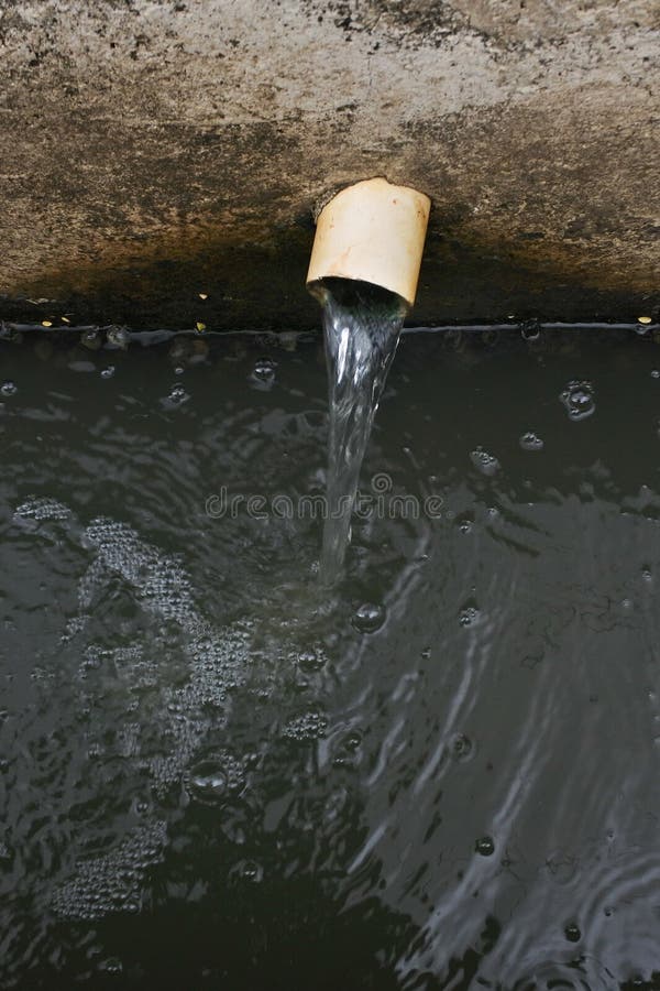 Drain Water Flowing from a Pipe Hole that is Implanted in the Wall of ...