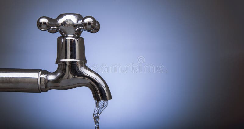 Drain Water From The Metal Tap Water Flowing From Modern Faucet Stock