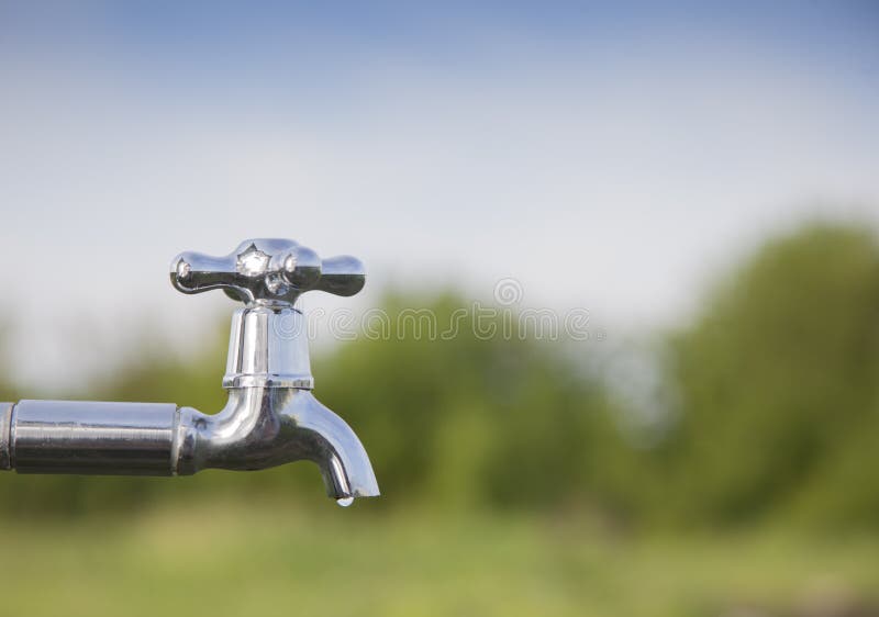 Drain Water From The Metal Tap Water Flowing From Modern Faucet Stock
