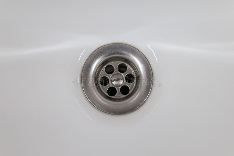 Drain in a White Ceramic Sink Stock Image - Image of washing, hole ...