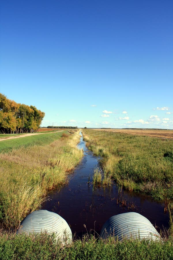 Drainage Ditch in the Peat Extraction Site. Drainage and Destruction of ...
