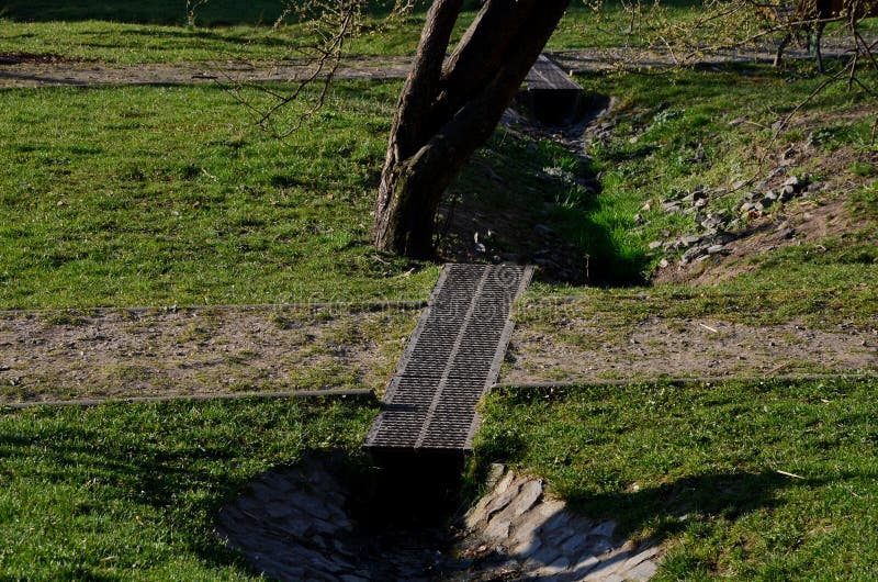 Drainage of the Path by Means of a Gutter Under Which Water Flows. the ...