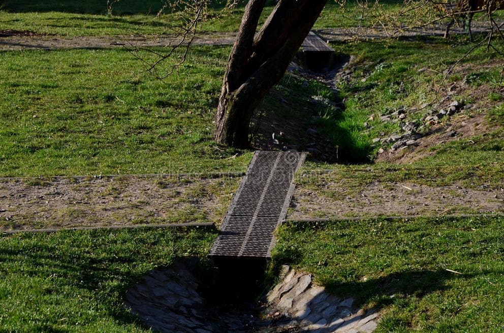 Drainage of the Path by Means of a Gutter Under Which Water Flows. the ...