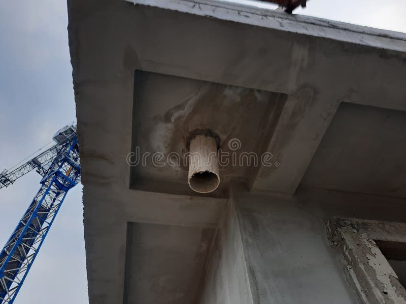 Drainage Pipe Installation through Concrete Ceiling Stock Image - Image ...