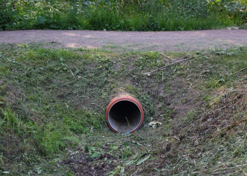 Drainage Plastic Pipe Under the Path in the Park Stock Photo - Image of ...