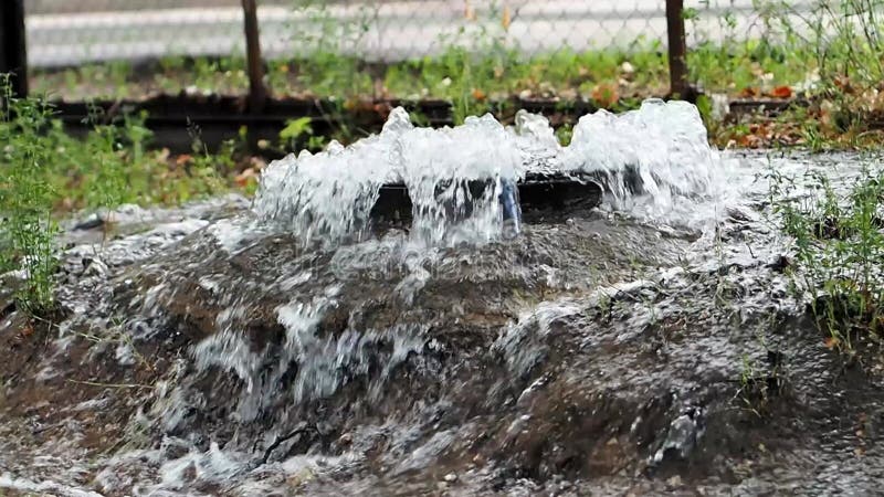 Water Flows Out of the Hatch, City Sewerage Failure. Breakthrough of ...
