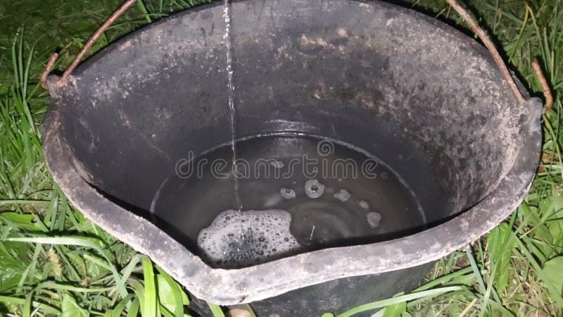 Draining Rainwater from a Drain into a Bucket Stock Footage - Video of ...