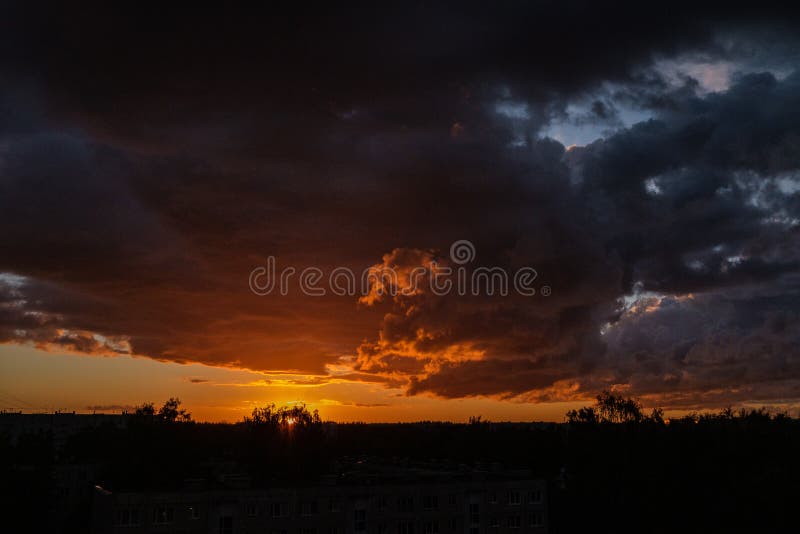 Dramatatic Red Dark Sunset Over the Fields and Cities Stock Image ...