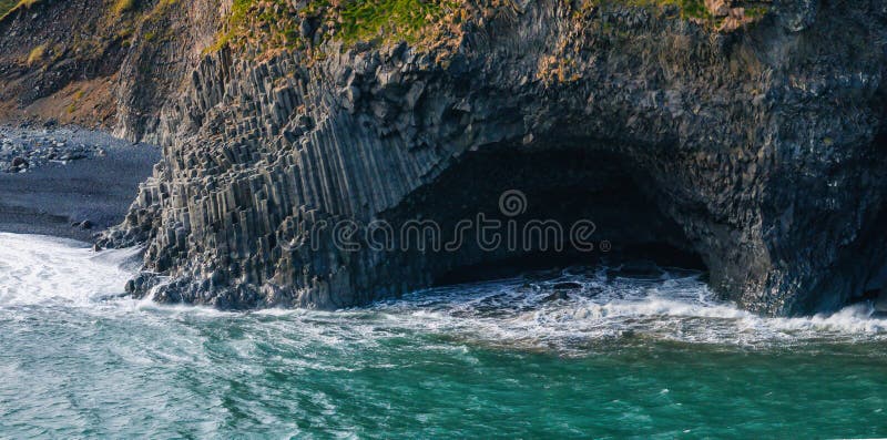 Aerial View of Hexagonal Volcanic Rock Formation on Icelandic Coastline ...