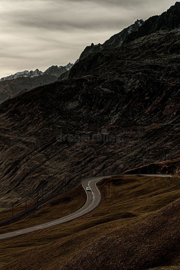 Dramatic Aerial View of a Curvy Highway Road at the Rocky Mountain ...