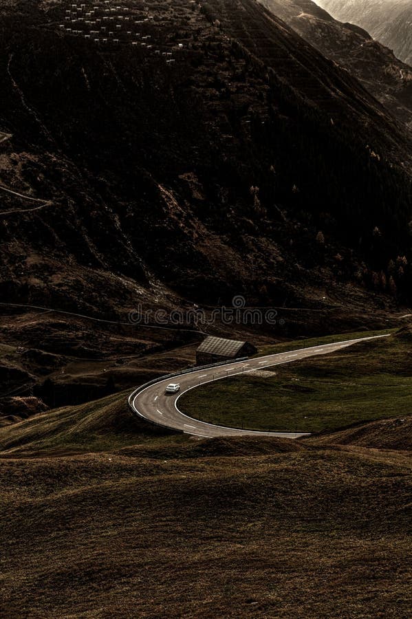 Dramatic Aerial View of a Curvy Highway Road at the Rocky Mountain ...