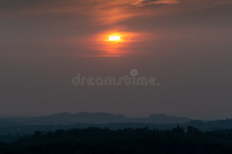 Dramatic Apocalyptic Sinister Scene of Bright Orange Sun Behind Clouds ...