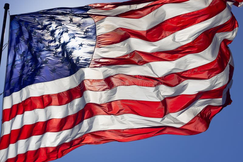 Patriotic Backlit American Flag Waving in the Wind Stock Photo - Image ...