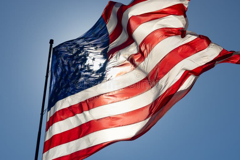 Dramatic Backlit American Flag Waving in the Wind Stock Image - Image ...