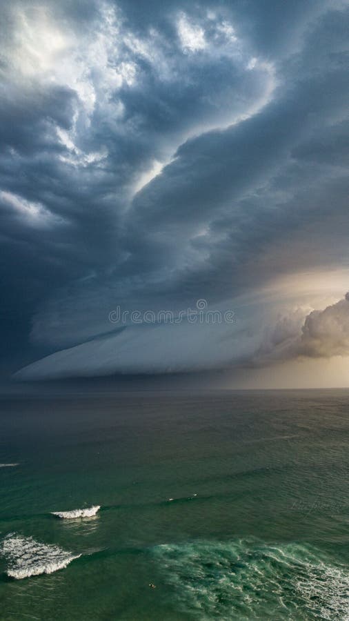 Dramatic Beach Scene with an Incoming Storm, with Dark Clouds Rolling ...
