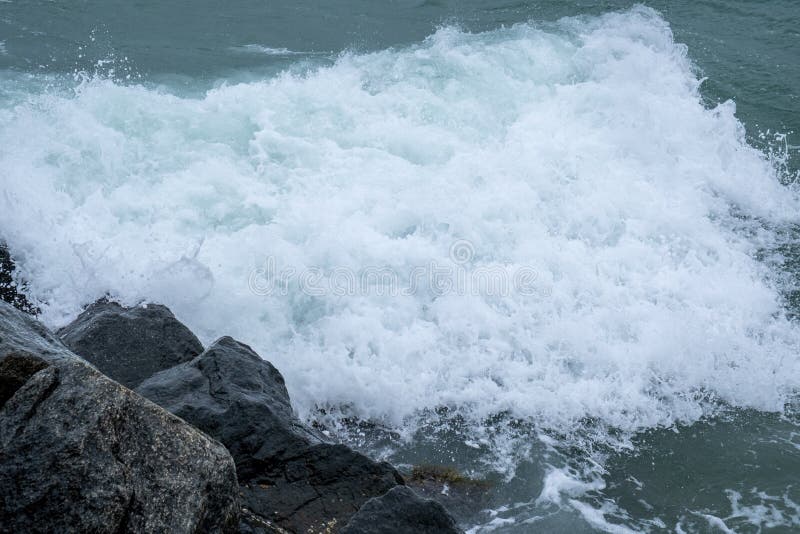 Dramatic Big Waves Splashing on the Rocks in a Sea Stock Image - Image ...