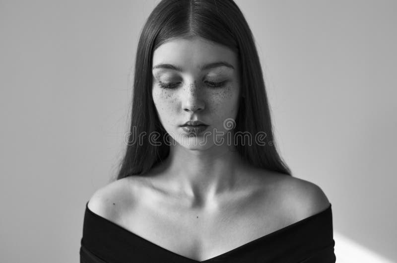 Dramatic Black And White Portrait Of A Beautiful Lonely Girl With