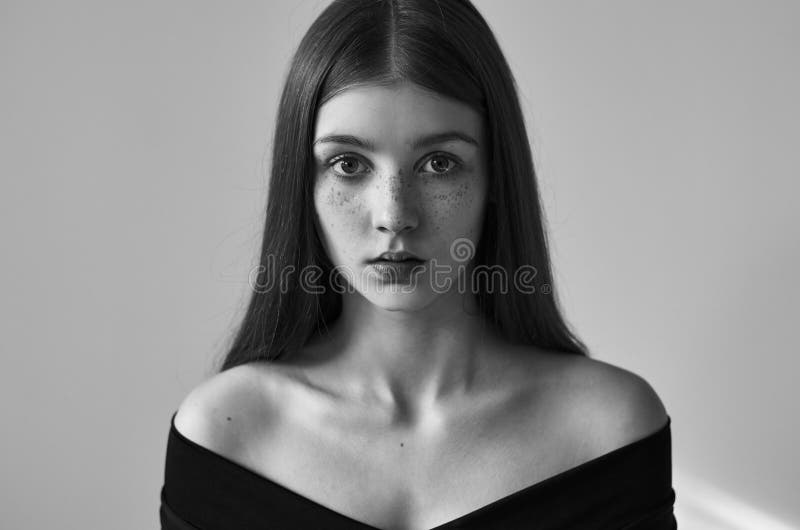 Dramatic Black And White Portrait Of A Beautiful Lonely Girl With