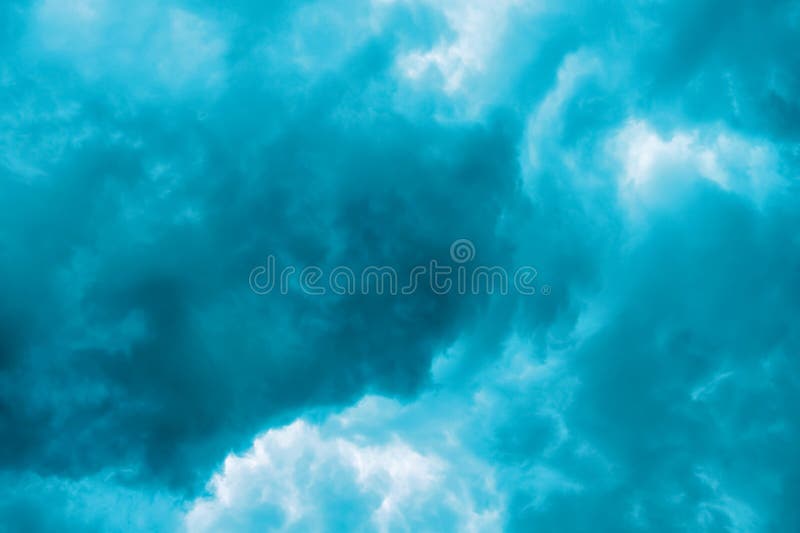 Dramatic Blue Cloudscape with Swirling Patterns Stock Image - Image of ...