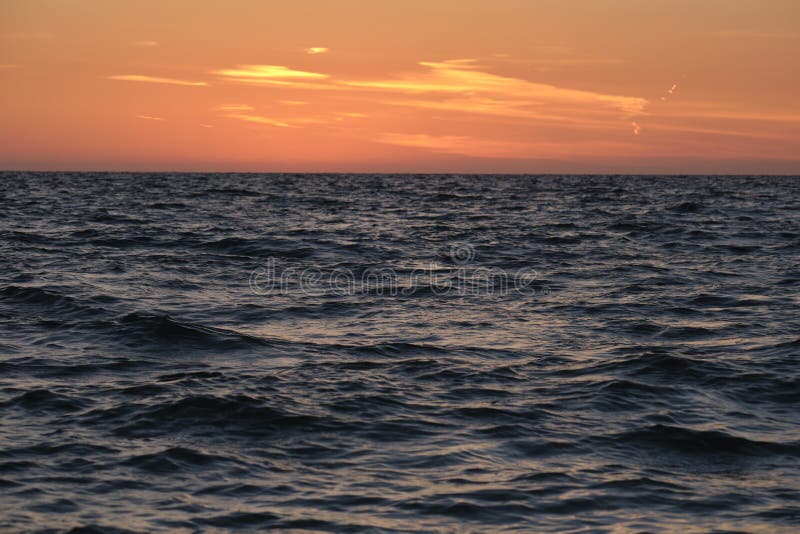 Dramatic Bright Red Sky at Ocean Sunset, Soft Evening Clouds Over Sea ...