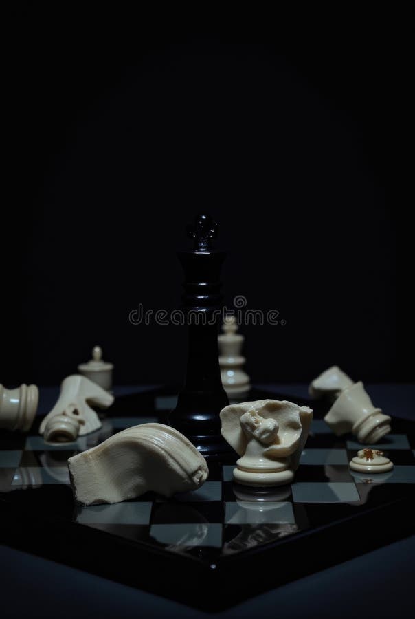 Dramatic Chess Game with Black Queen and Fallen White Pieces on Dark ...