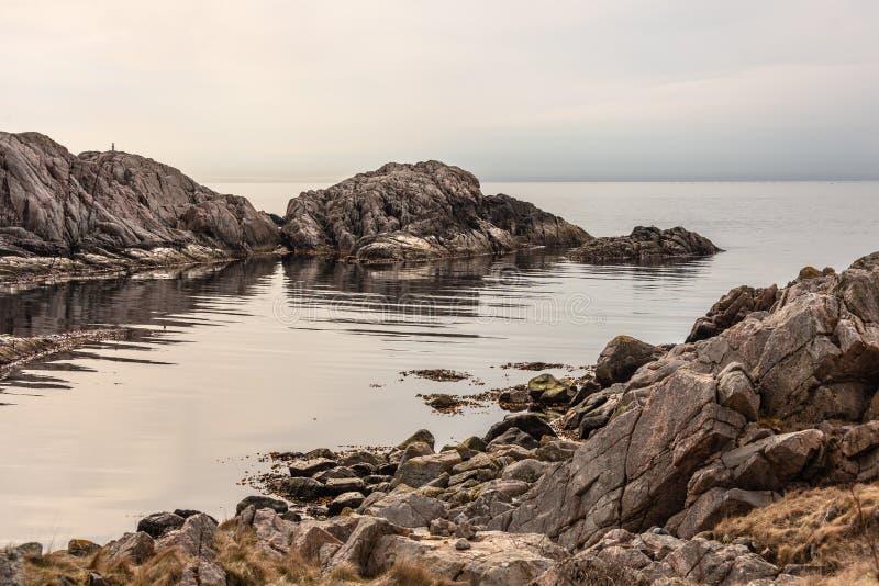 Dramatic Cliffs by a Calm Ocean.. Stock Image - Image of nature, cloud ...
