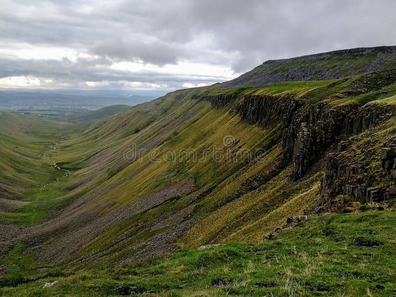 A Cliff Lined Valley with Scree Slopes Stock Image - Image of dramatic ...