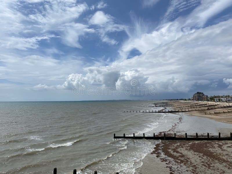 Dramatic Cloud Formations and High Up View Over Beach Looking West ...