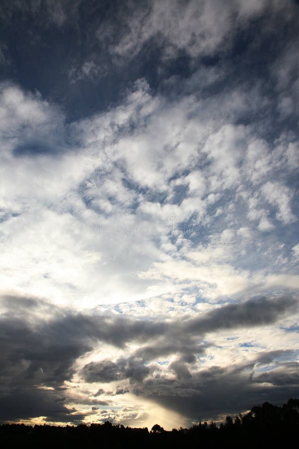Dramatic Scene with Sun, Clouds and Rocks Stock Photo - Image of alps ...