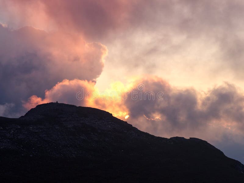Dramatic Clouds Over Mountain Ridge in Sunset Stock Image - Image of ...