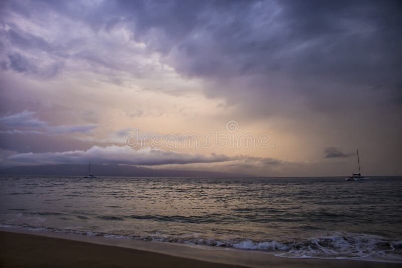 Dramatic Clouds Over Ocean Sunset with Boats As Hurricane Storm Stock ...