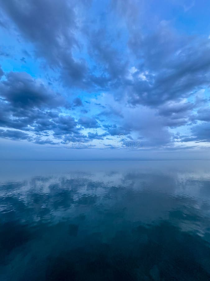 Dramatic Clouds Over the Sea. Natural Landscape. Rain and Large Dark ...