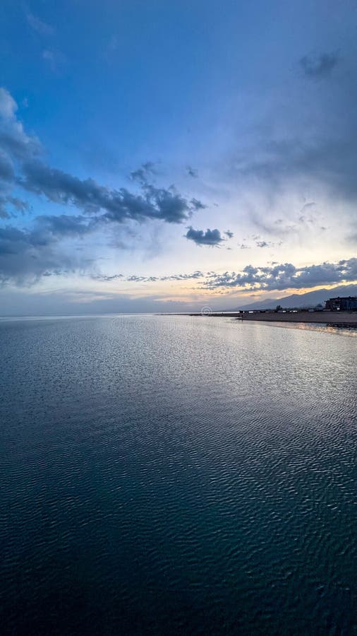 Dramatic Clouds Over the Sea. Natural Landscape. Rain and Large Dark ...