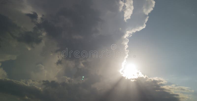 Dramatic Clouds with Sunlight Shining through, Creating a Dynamic Sky ...