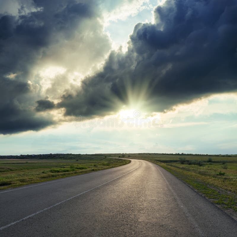 Dramatic Clouds in Sunset Over Asphalt Road Stock Image - Image of auto ...