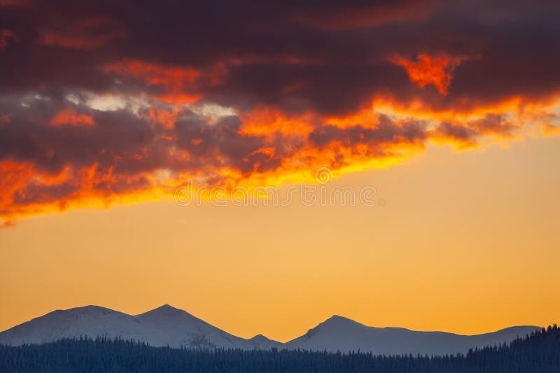 Dramatic Cloudy Sky with Golden Sunlight Breaking through at Sunset. a ...