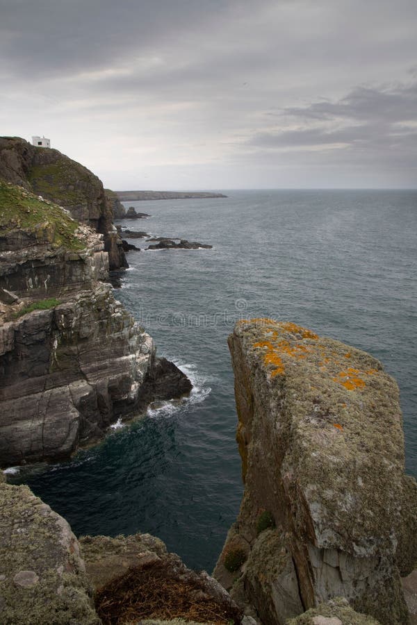 Dramatic Coastal Cliffs with Ocean Waves on Anglesey Island, Wales ...