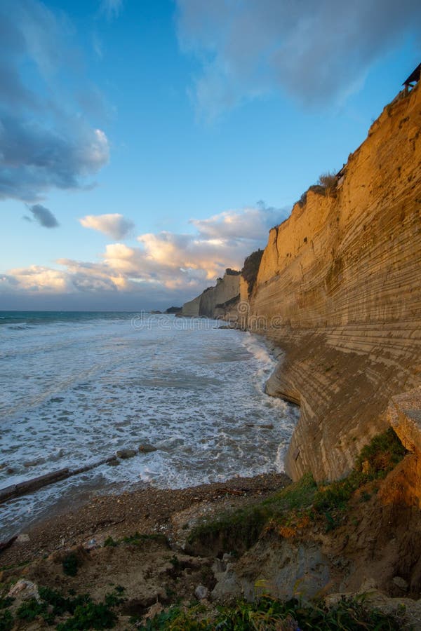 Dramatic Coastal Cliffs at Sunset Stock Image - Image of evening ...