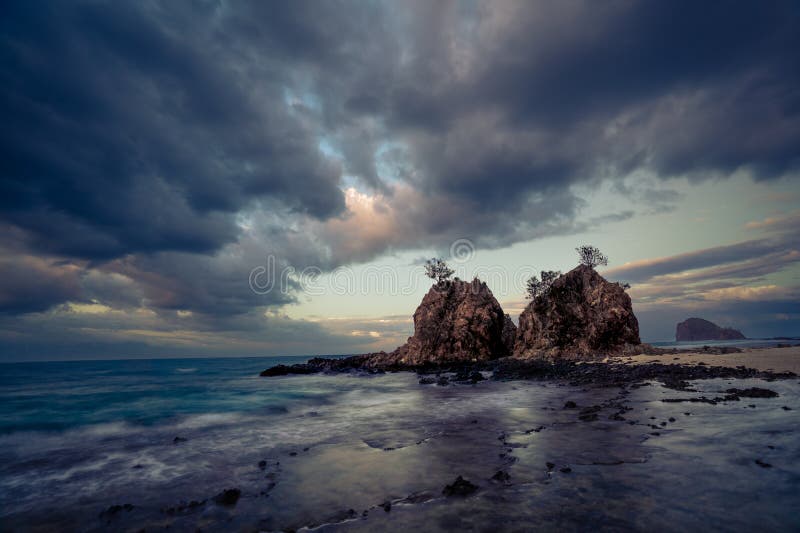 Dramatic Coastal Scene of Diguisit, Aurora Featuring Two Rugged Rock ...