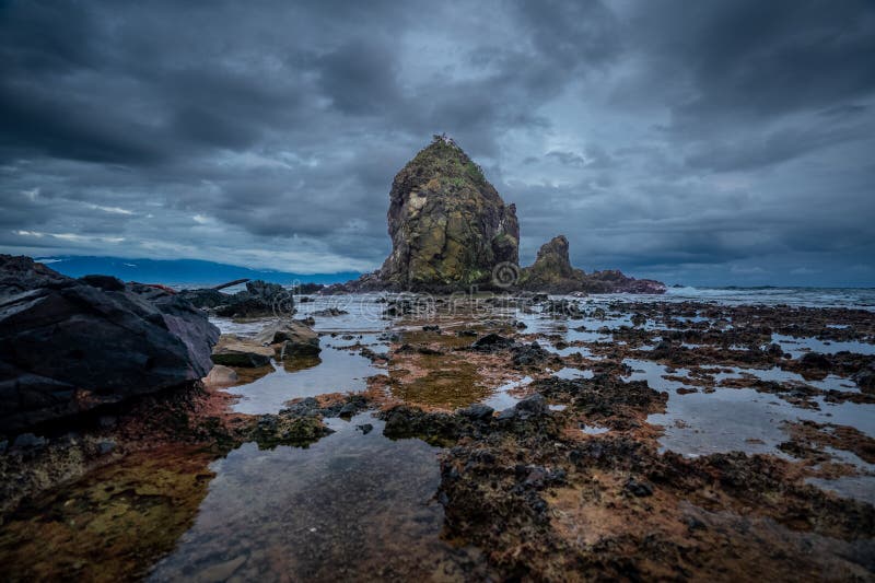 Dramatic Coastal Scene of Diguisit, Aurora Featuring Two Rugged Rock ...