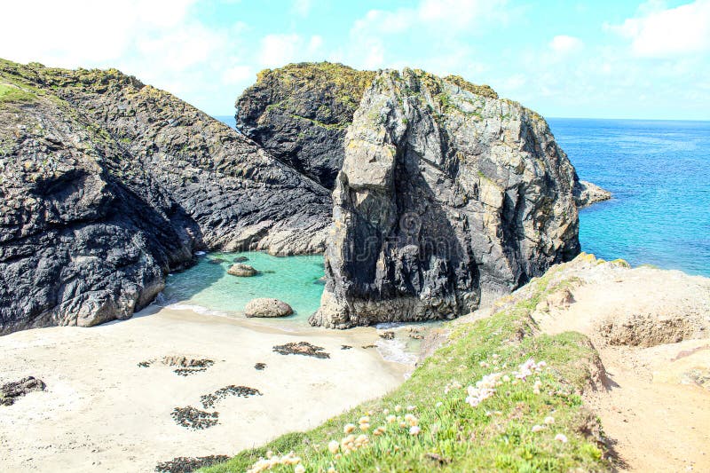 Secluded Rocky Cove with Turquoise Water and Sheer Cliffs in Cornwall ...