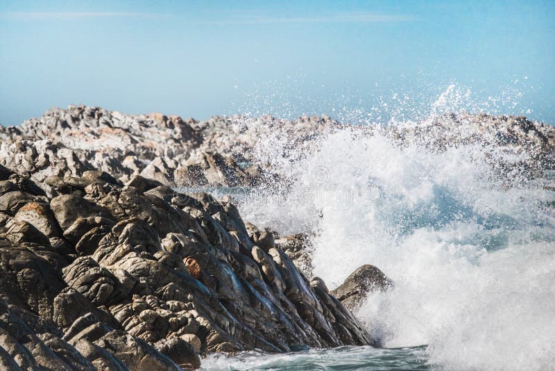 Dramatic Crashing Waves Hitting Rocks on the Shore. Editorial ...