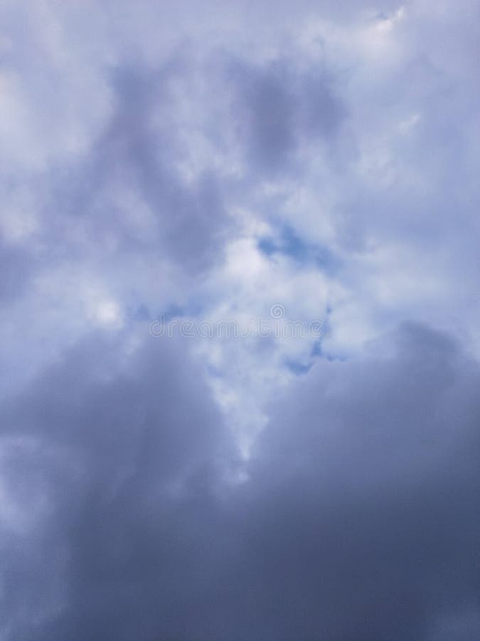 Dramatic Cumulus Clouds Captured in the Portrait Stock Image - Image of ...