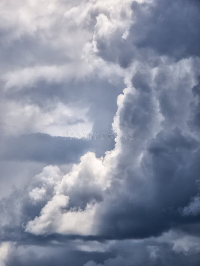 Dramatic cumulus clouds stock image. Image of horizon - 57709919