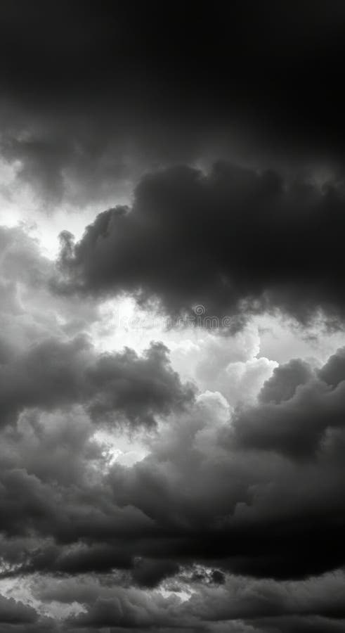 Dramatic Dark Clouds Fill the Sky, Creating a Moody Monochrome ...