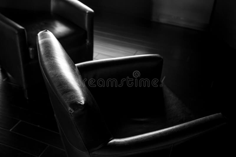 Dramatic Dark Lighting on Comfortable Office Chair Stock Image - Image ...