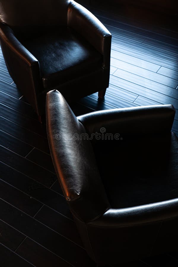 Dramatic Dark Lighting on Comfortable Office Chair Stock Image - Image ...